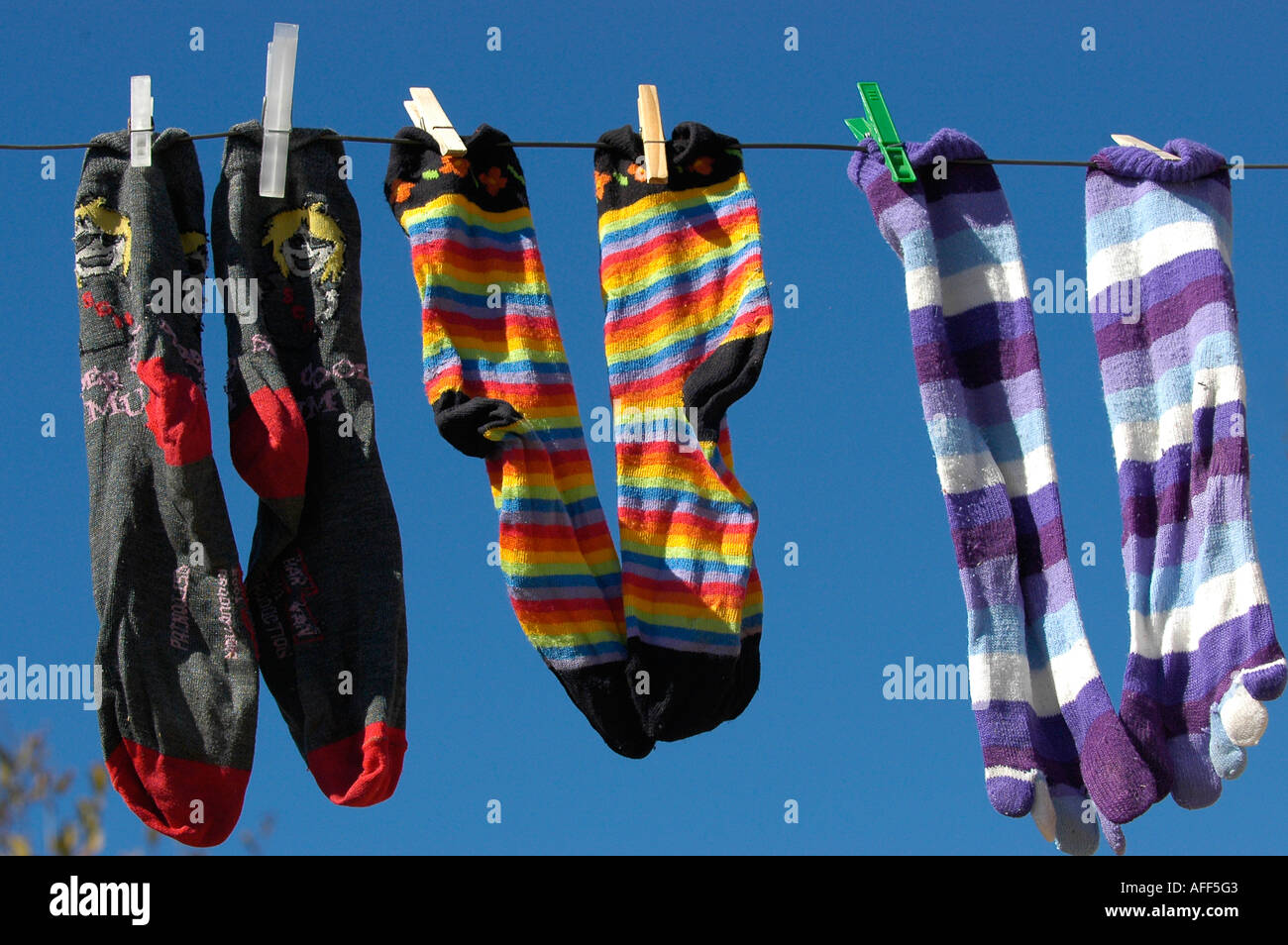 colourful socks on washingline Stock Photo - Alamy