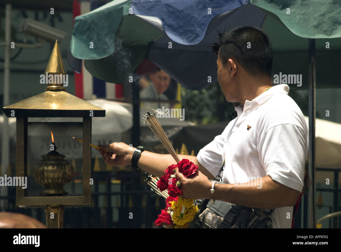 Lighting incense sticks bangkok hi-res stock photography and images - Alamy