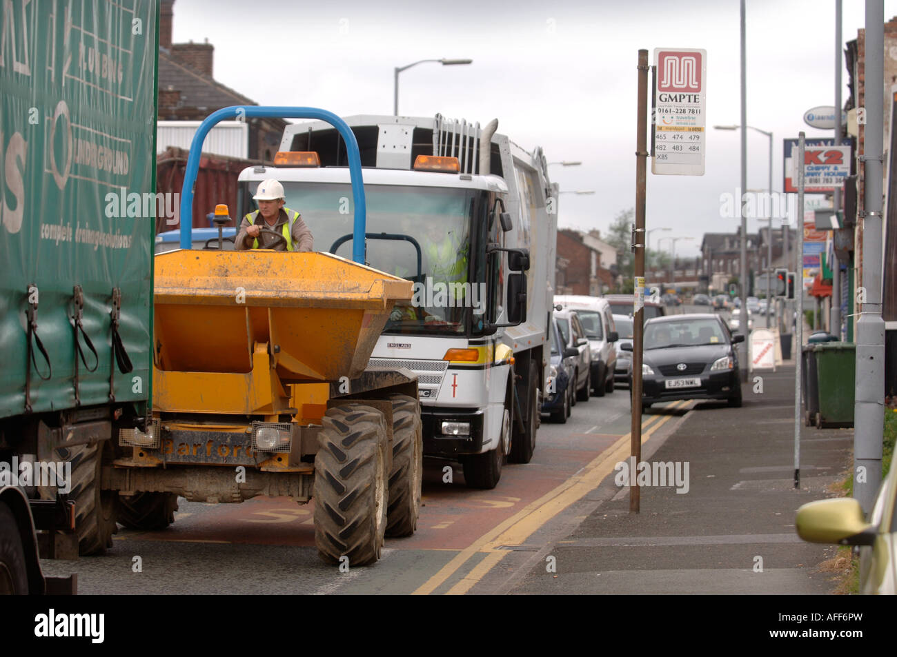 A DUMP TRUCK IN A QUEUE OF TRAFFIC IN BURY UK Stock Photo - Alamy