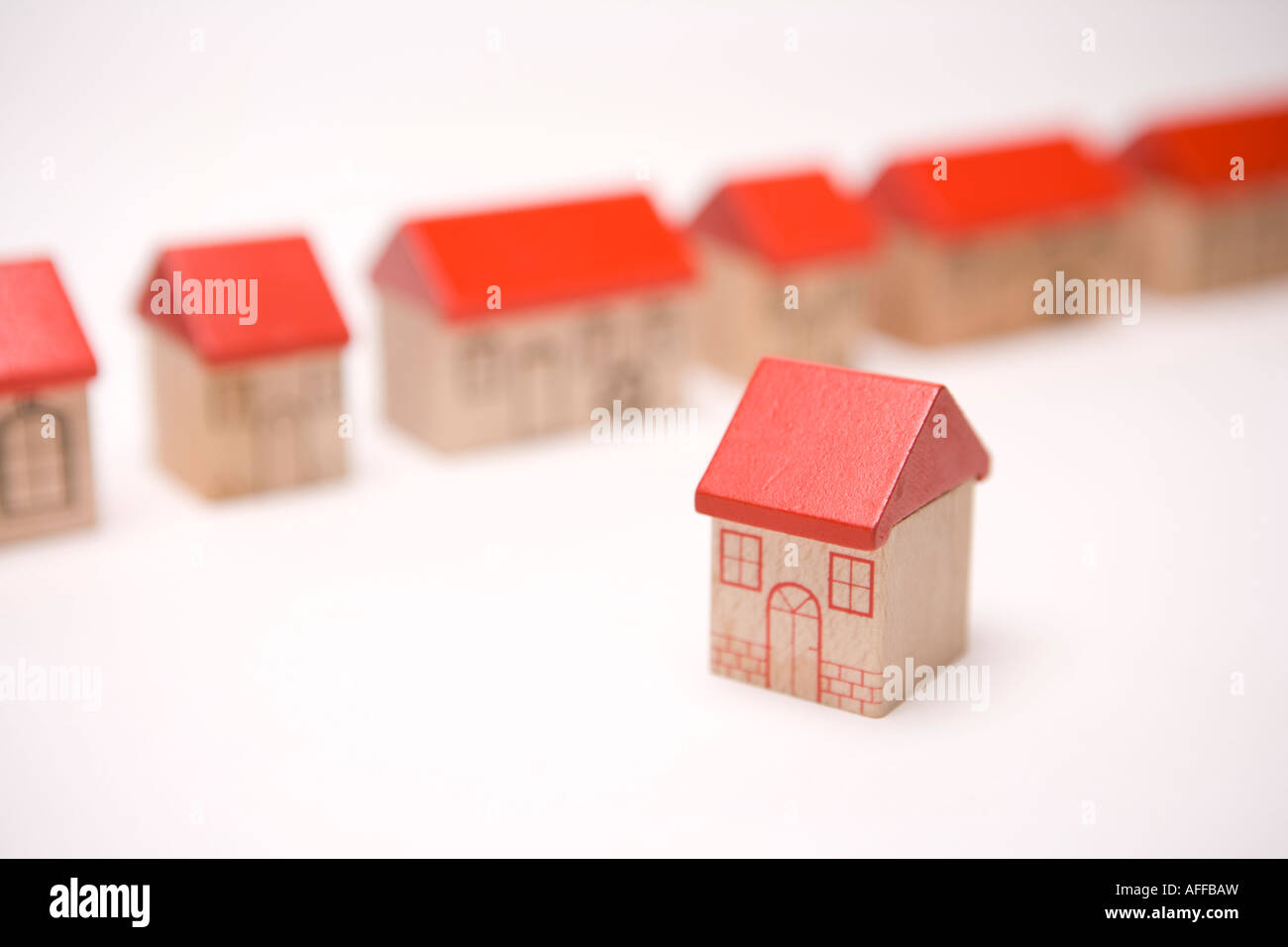 Housing row of houses with single property standing out all on its own ...