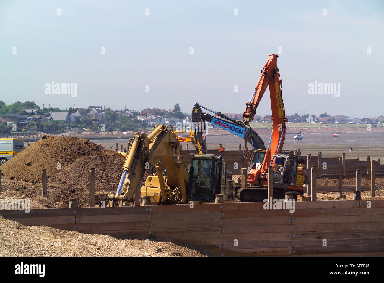 Sea defence building in whitstable kent raising the level of the beach ...