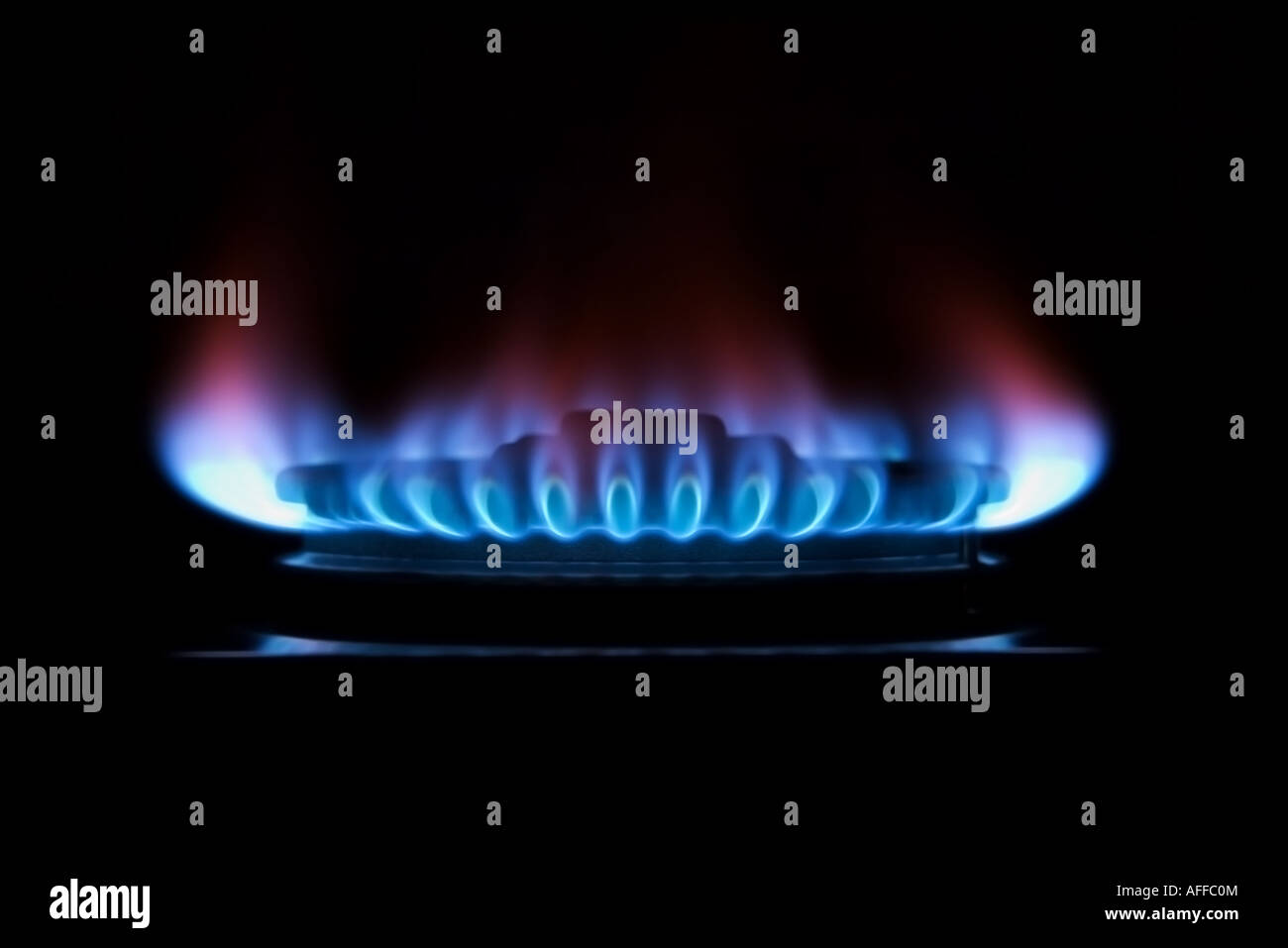 flame of a gas ring in the darkness Stock Photo - Alamy