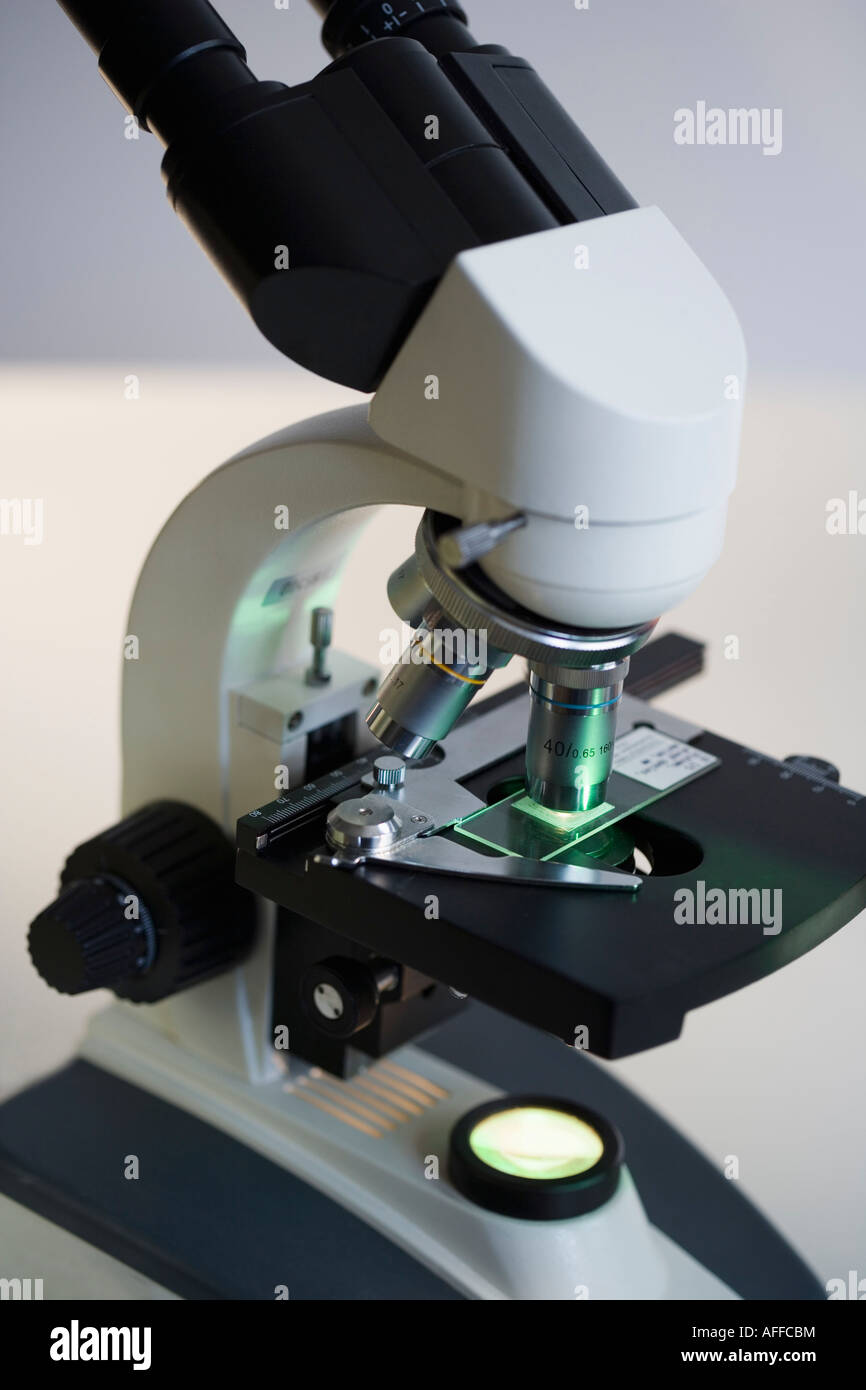 Modern research microscope with examination slide Stock Photo - Alamy