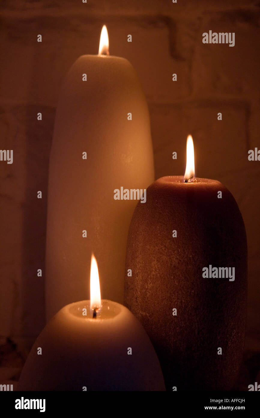Close up shot of a burning wax candles Stock Photo - Alamy