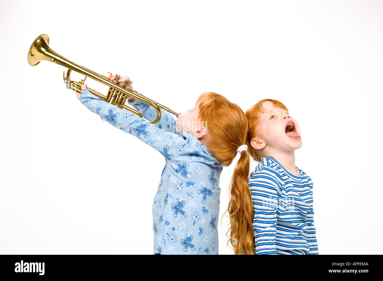 Playing trumpets hi-res stock photography and images - Alamy