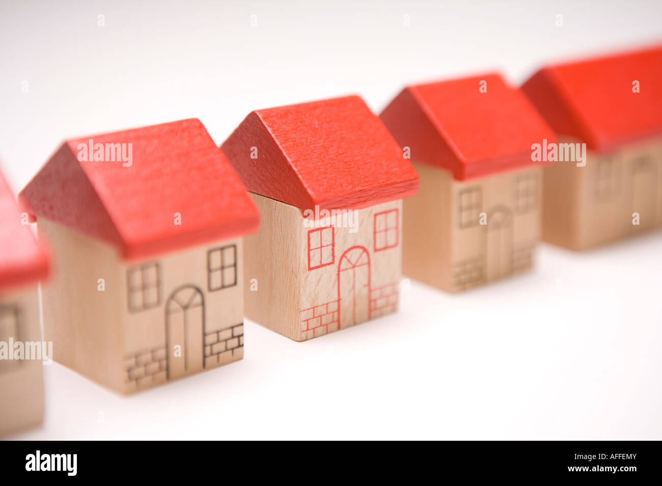 Housing row of houses with single property standing out all on its own ...