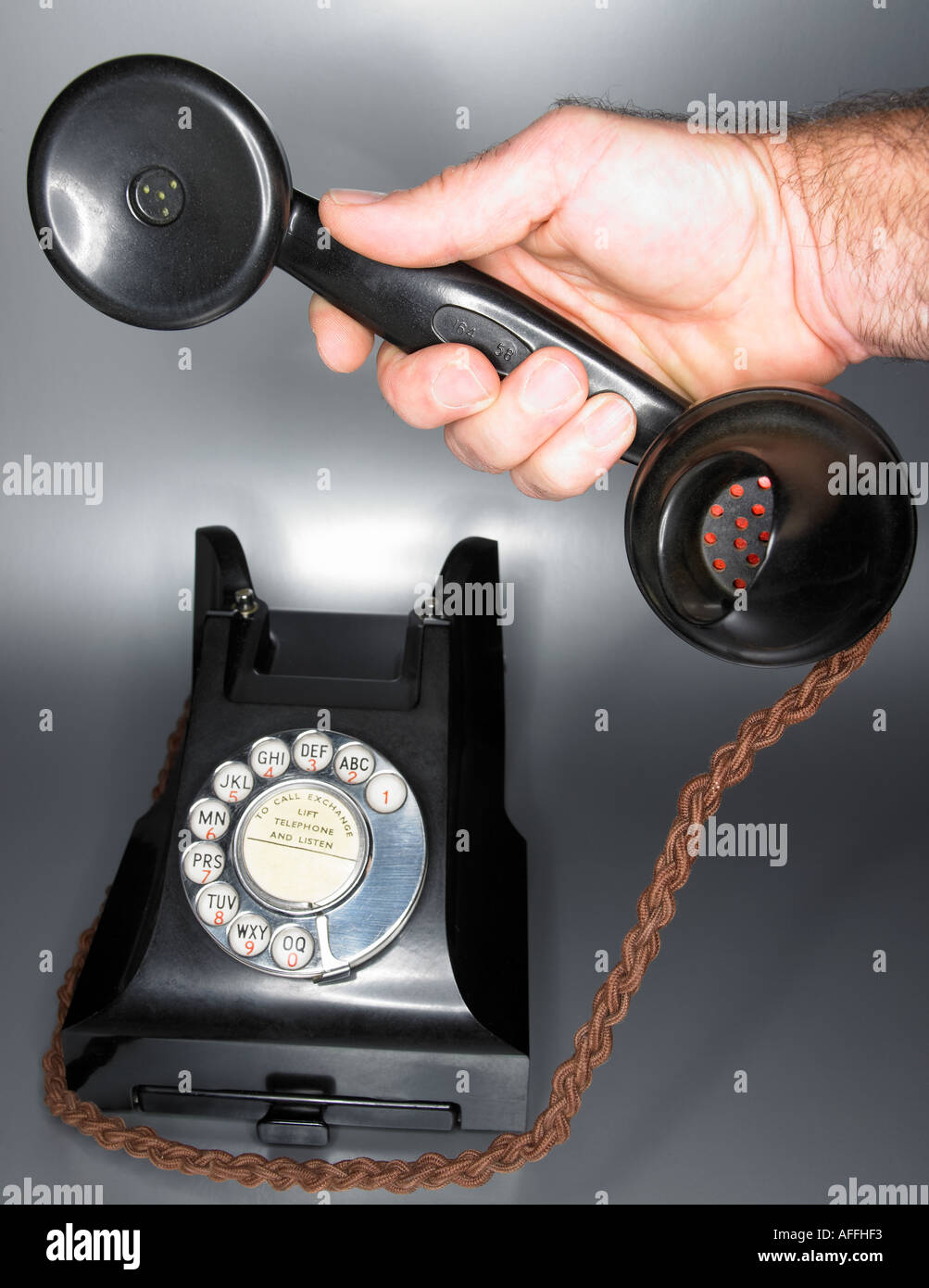 Hand lift receiver vintage telephone hi-res stock photography and ...