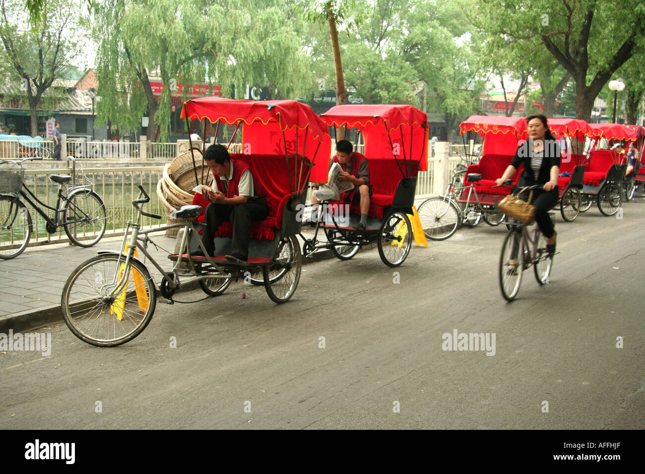 Chinese rickshaws hi-res stock photography and images - Alamy