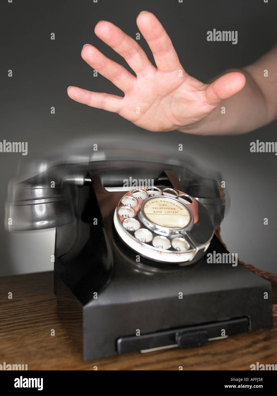 Hand lift receiver vintage telephone hi-res stock photography and ...