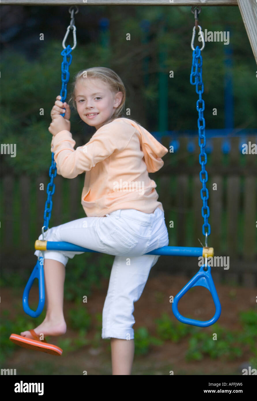 Child on a swing Stock Photo - Alamy