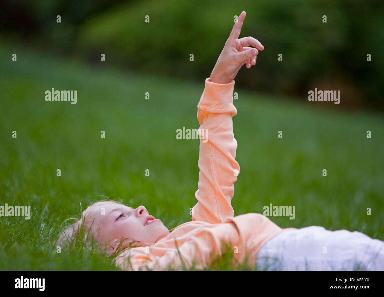 Child pointing toward the sky Stock Photo - Alamy
