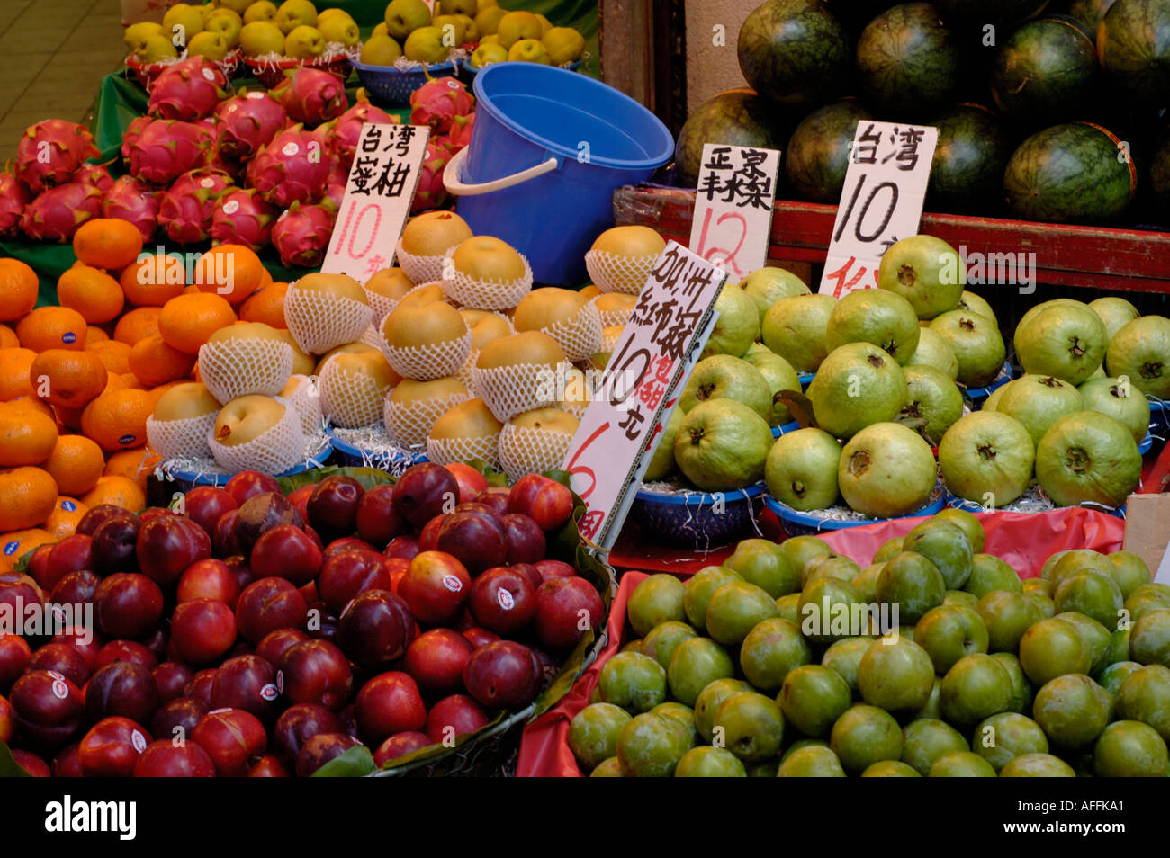 Typical market stall selling fresh fruit to local residents in Wan Chai ...