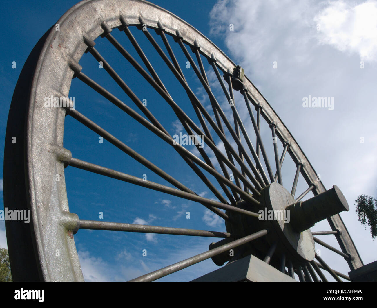 Close up of Gresford Miners memorial showing colliery wheel Stock Photo ...