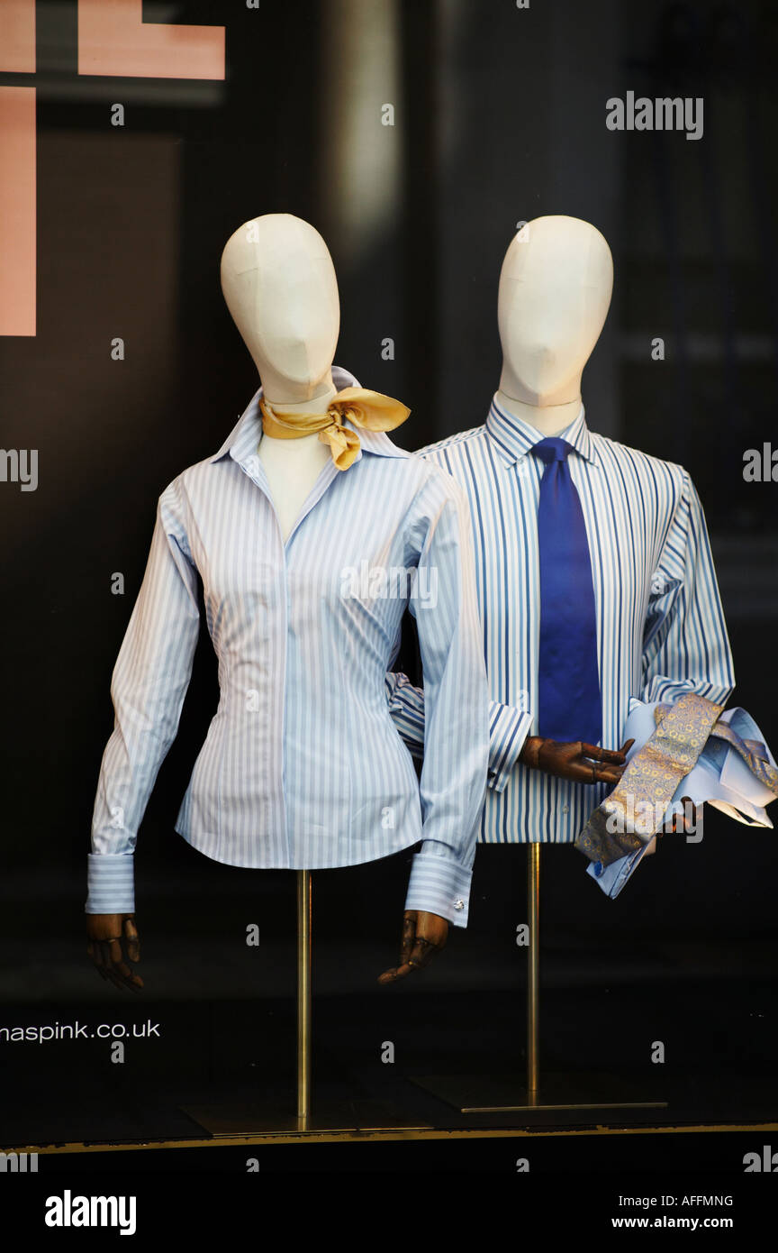 faceless fashion clothes clothing manequins in a shop window in London ...