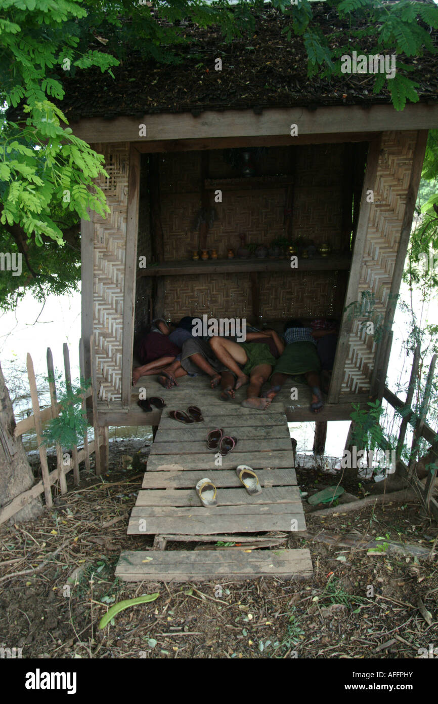 Work men having a sleep in the afternoon after lunch. Burma Stock Photo ...