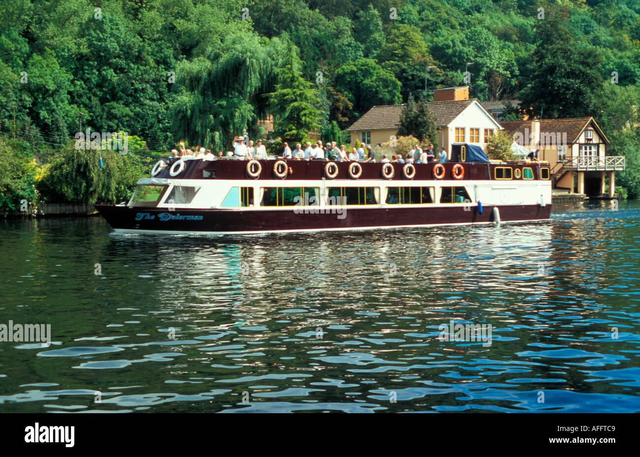 Tour boat cruising on the Thames at Henley Oxfordshire Stock Photo - Alamy