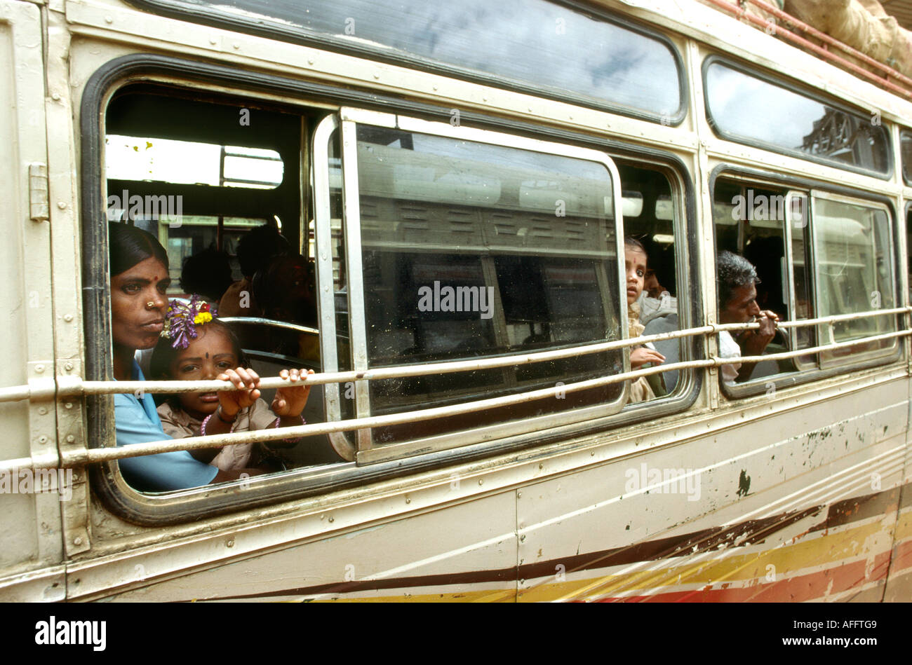 Woman child looking out of bus window hi-res stock photography and ...