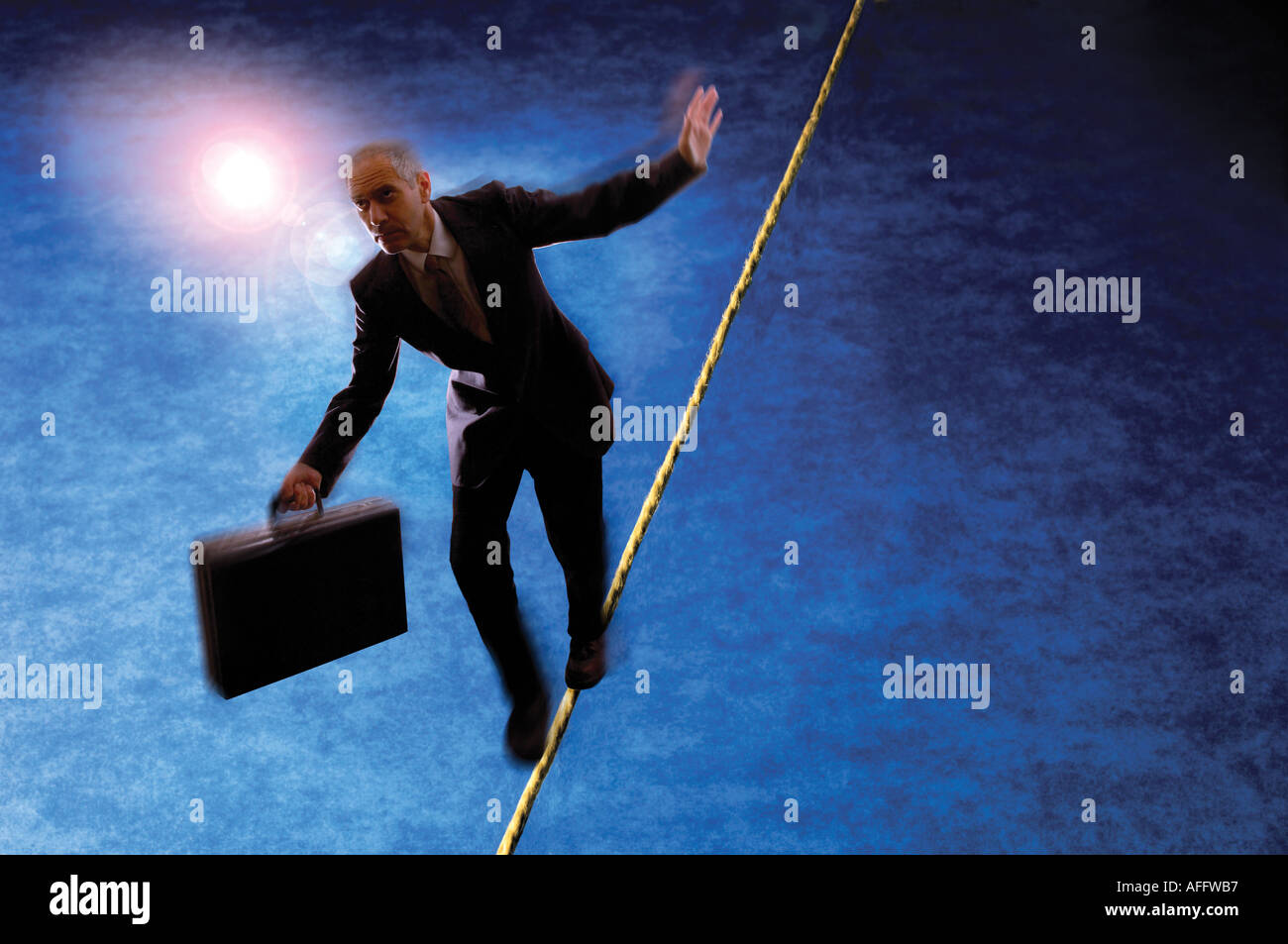 Businessman tightrope hi-res stock photography and images - Alamy