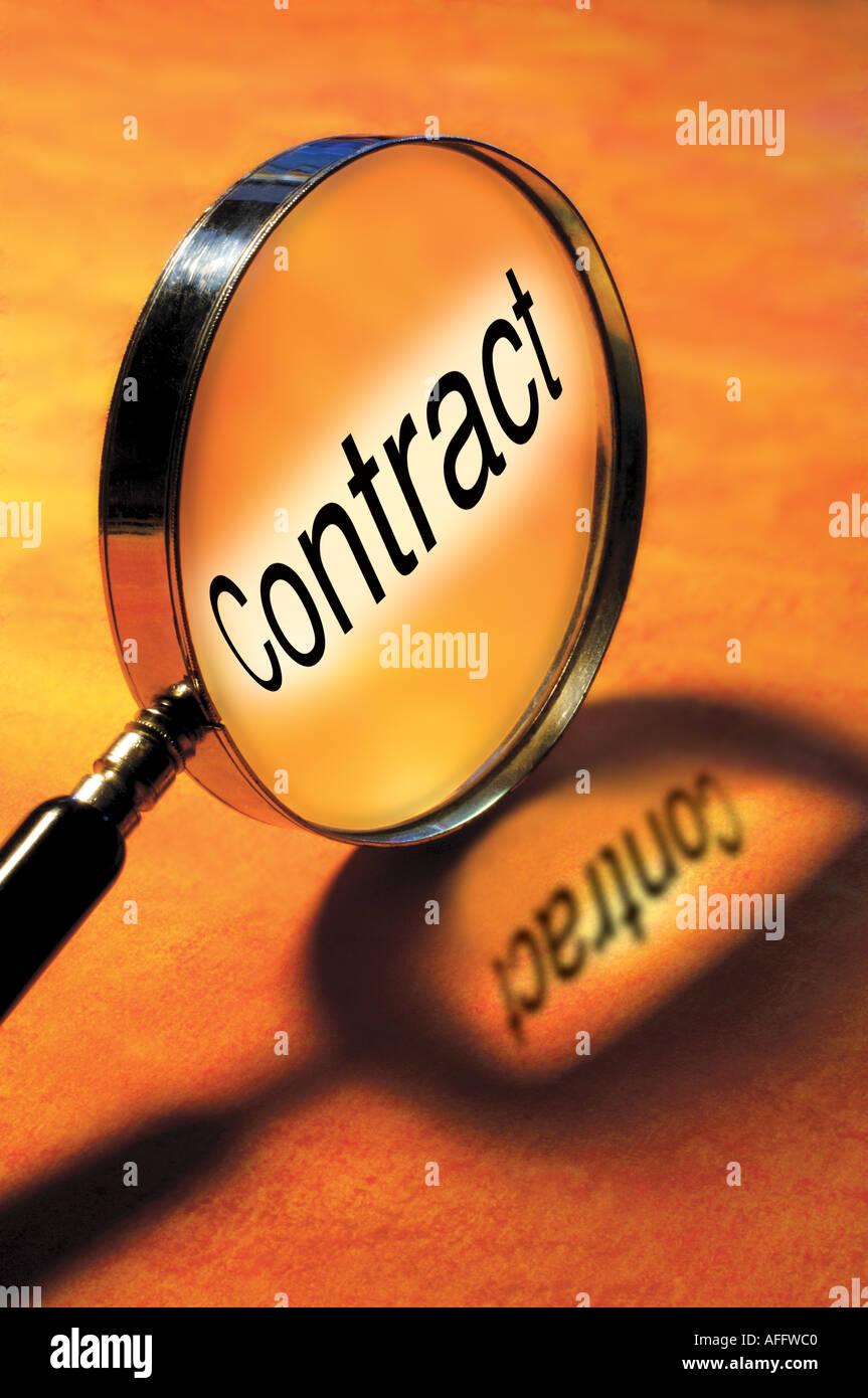 magnifying glass focusing on contract Stock Photo - Alamy magnifying glass focusing on contract Stock Photo - Alamy