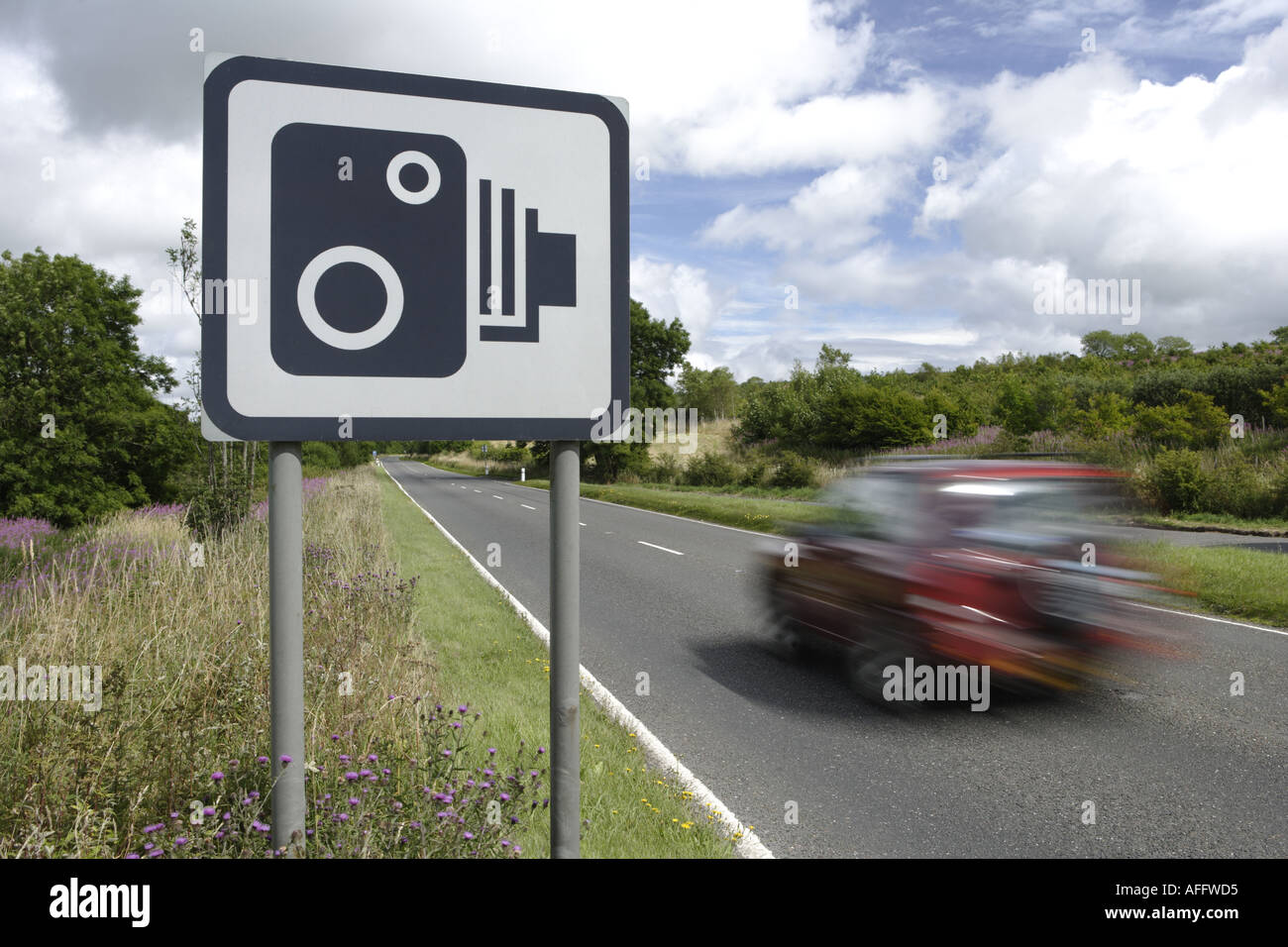 Car passing speed camera sign Stock Photo - Alamy