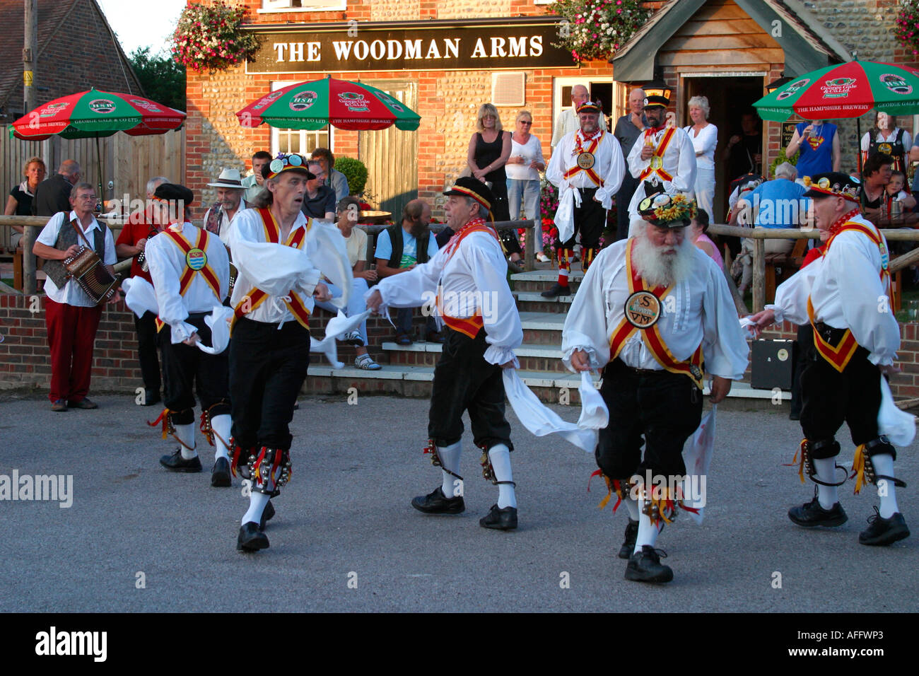 Morris Dancers performing traditional dances on a summers evening ...