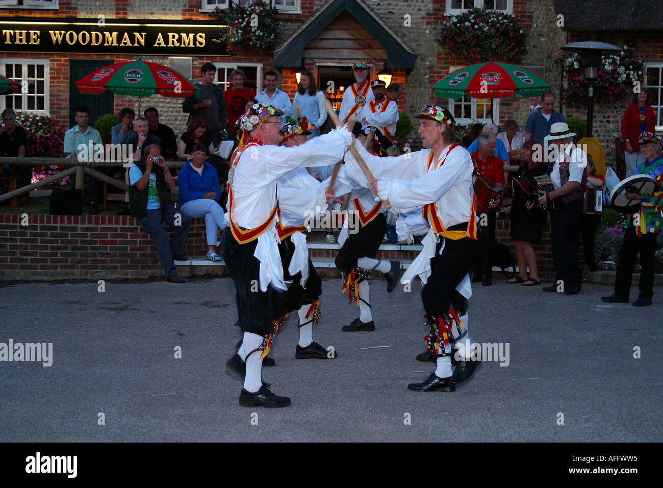 Morris Dancers performing traditional dances on a summers evening Stock ...