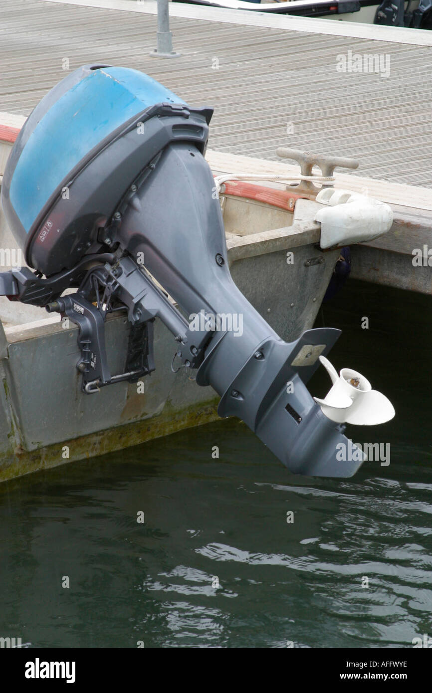Outboard motor attached to stern of boat Stock Photo - Alamy