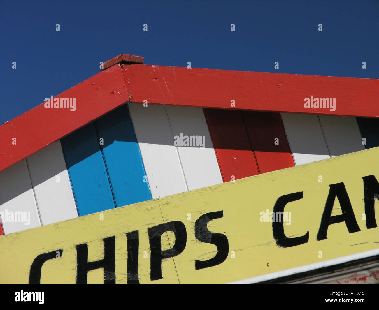 Chips and candy signs on a beach shack Stock Photo - Alamy