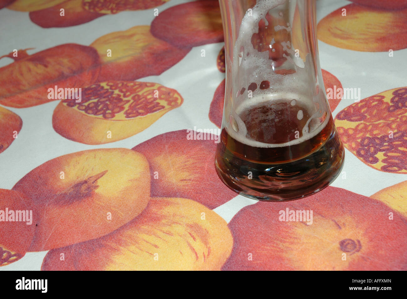 Nearly empty glass of beer Stock Photo - Alamy