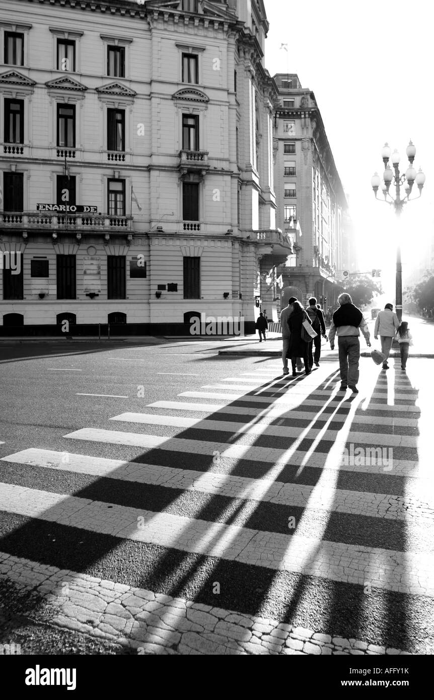 Long late afternoon shadows couple Black and White Stock Photos ...