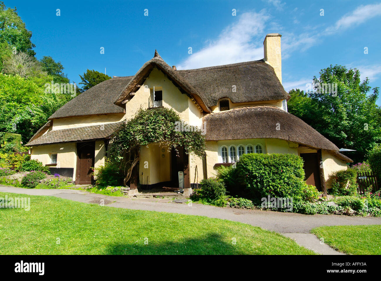 Selworthy village green Thatch thatched cottage Somerset England UK GB ...