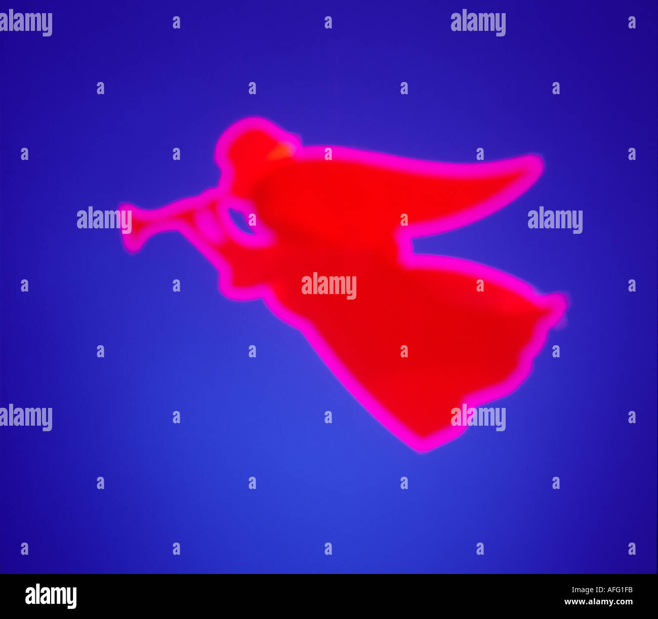 Red angel with trumpet Stock Photo - Alamy