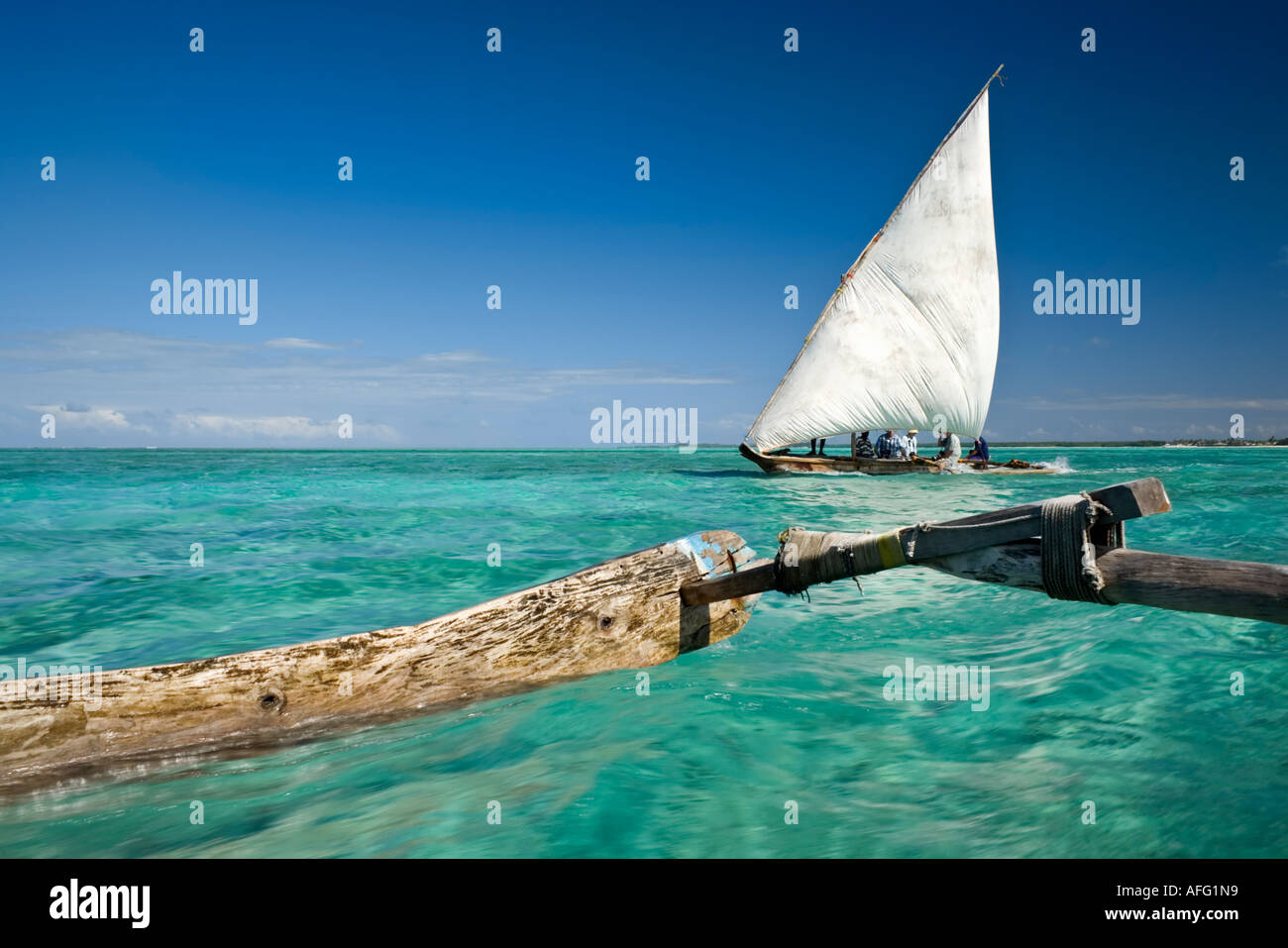 Traditional East African Dhow sailing on the Indian Ocean, Jambiani ...