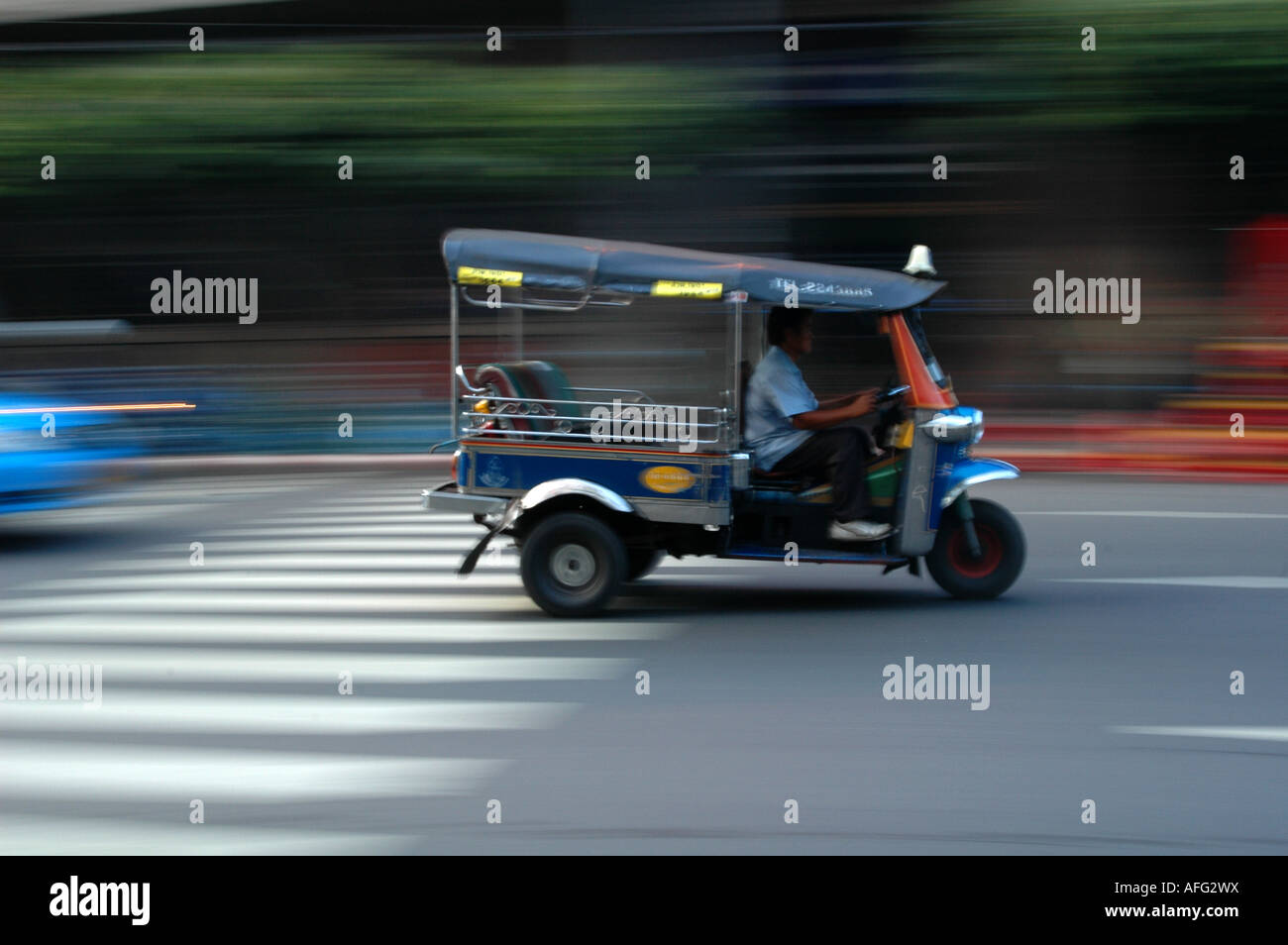 Panning view of a moving Tuk-Tuk/Rickshaw, Bangkok, Thailand Stock ...