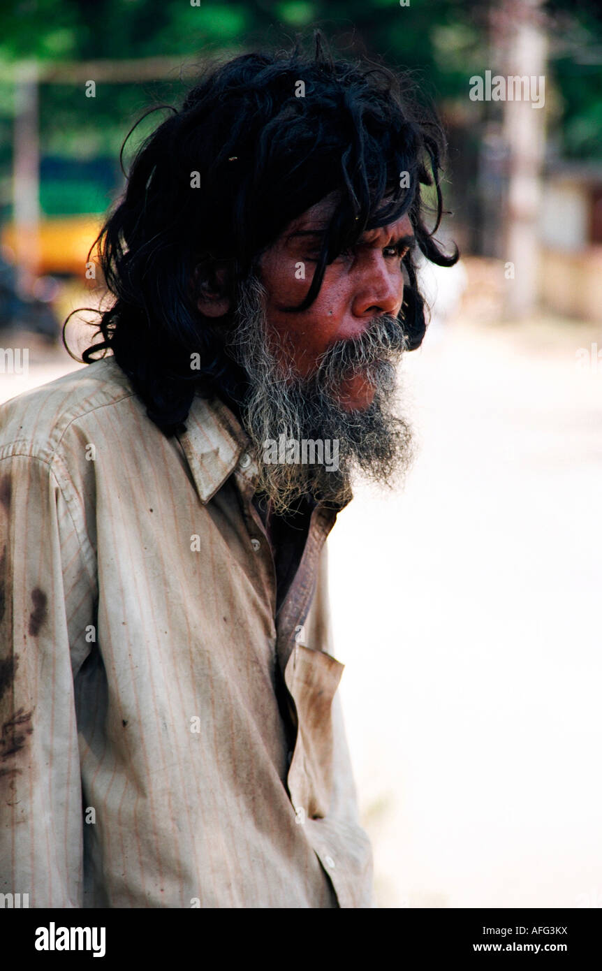 Indian man begging on streets in Bombay Stock Photo - Alamy