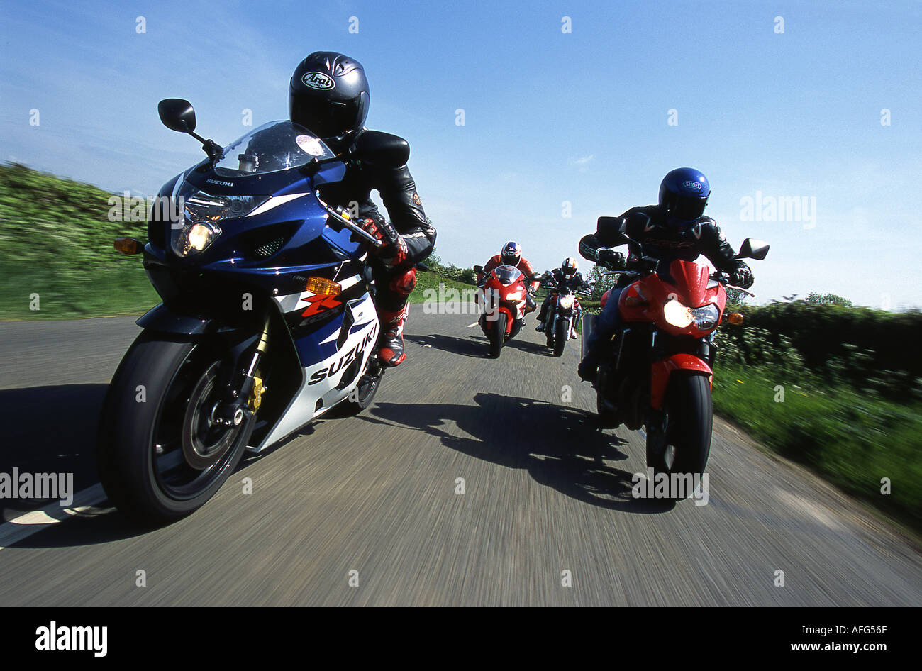 a group of bikers on the open road in England Stock Photo - Alamy
