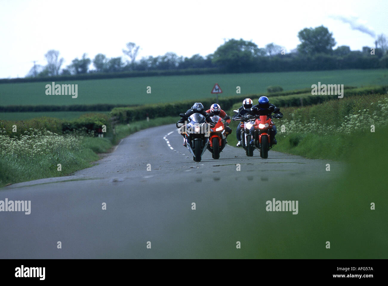 a group of bikers on the open road in England Stock Photo - Alamy