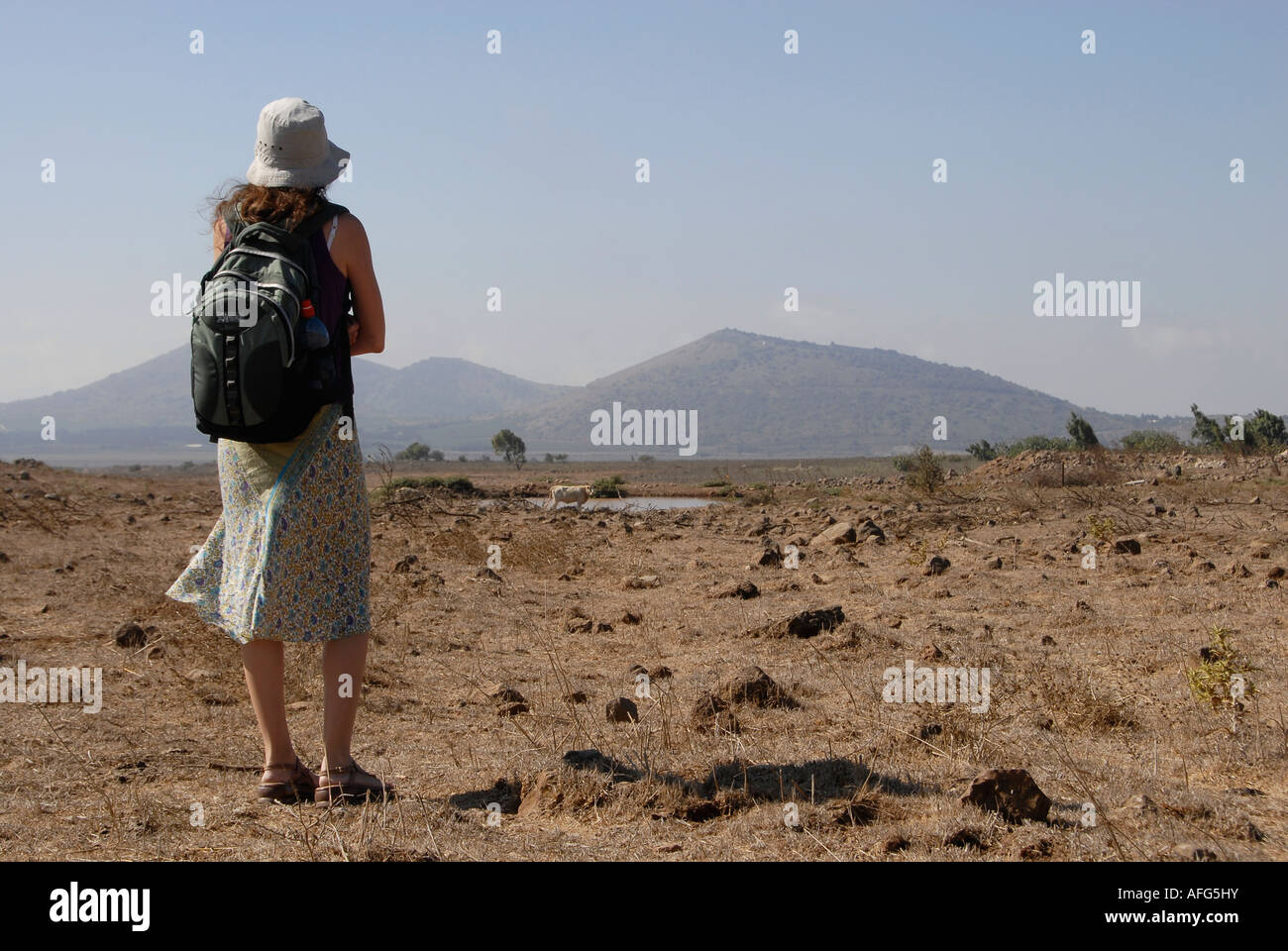 A woman hiking in the Golan Heights near the Israeli border with Syria ...