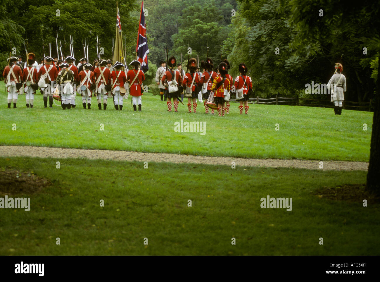 American revolutionary war reenactors prepare for mock combat at Edward ...