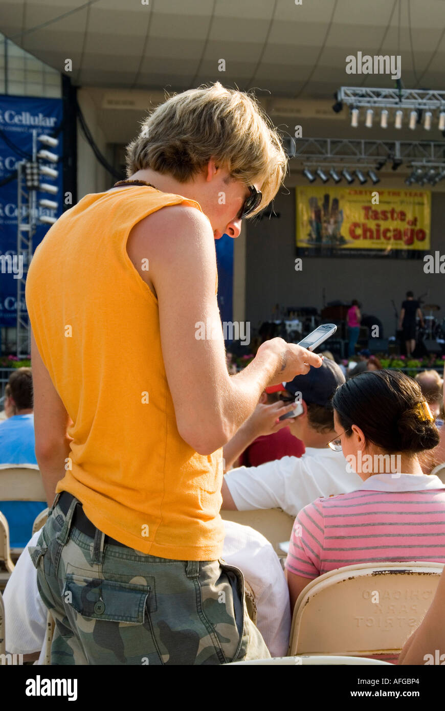 Cell Phone User at Chicago's Taste of Chicago Stock Photo - Alamy
