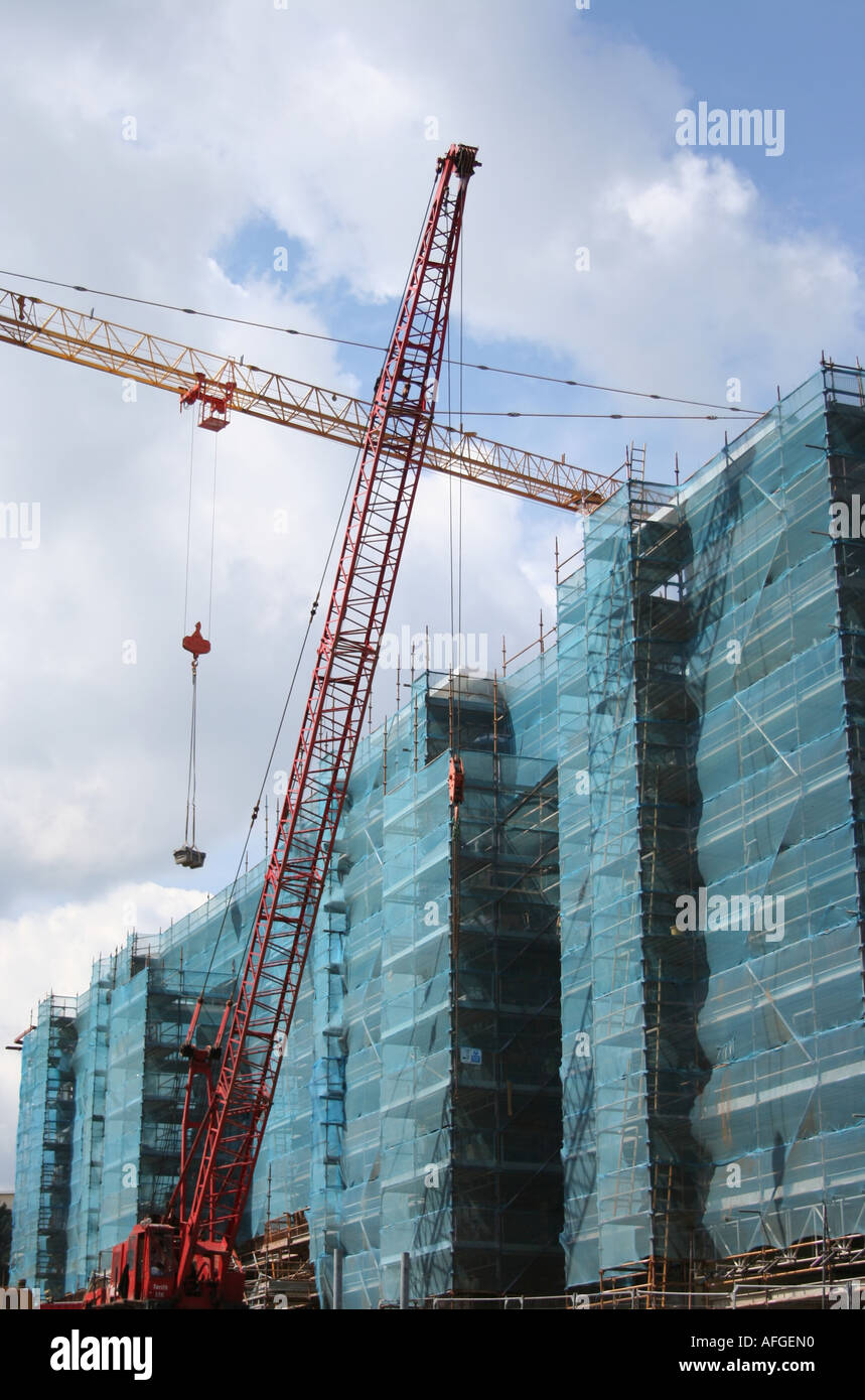 Construction cranes at building sites Stock Photo - Alamy
