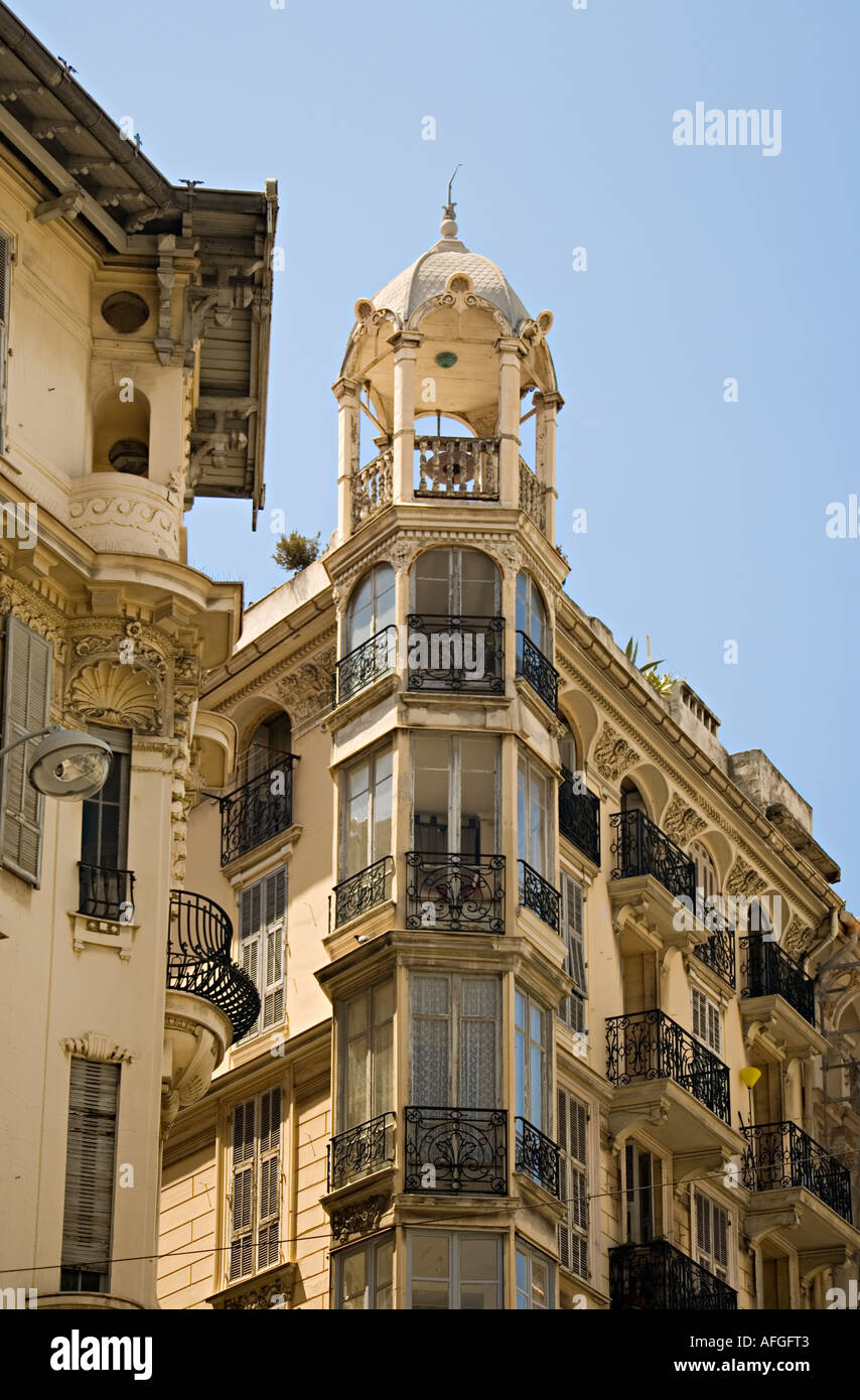 An ornate series of corner rooms topped by a cupola on a Belle Epoque ...