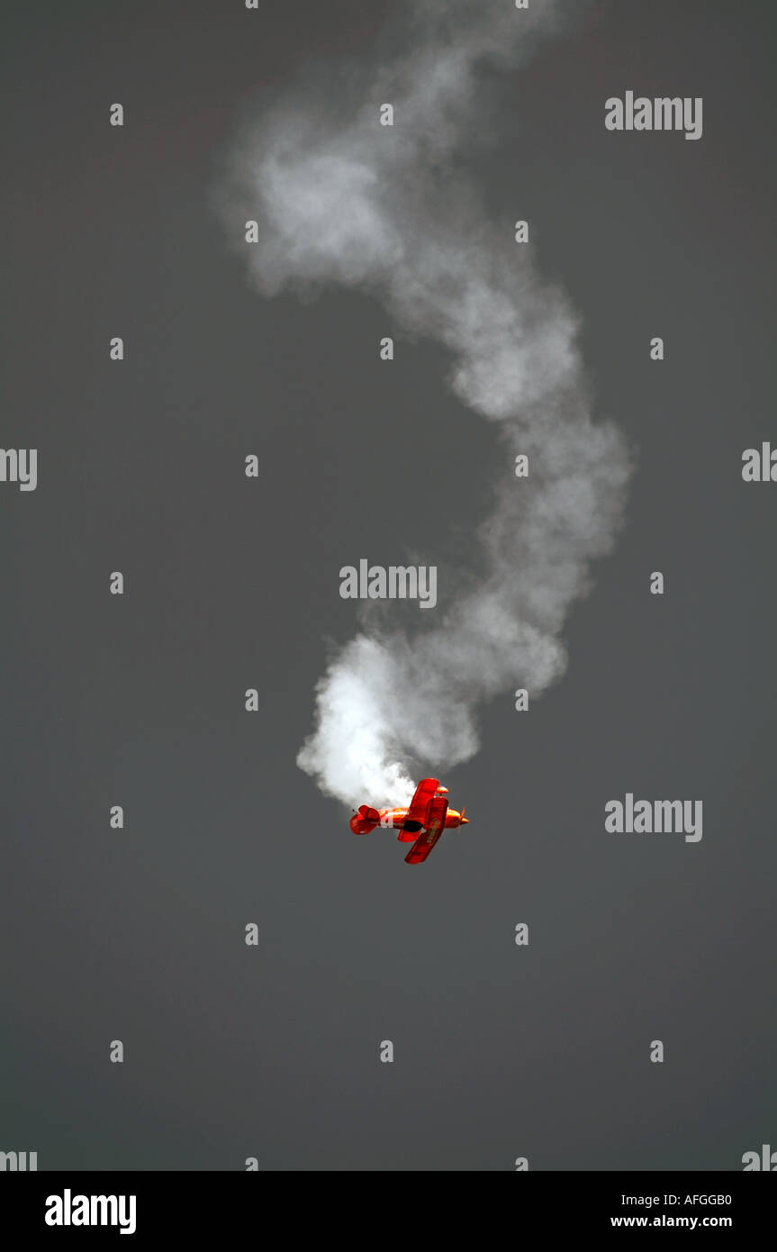 Radio controlled stunt plane performing an aerobatic display loop the ...