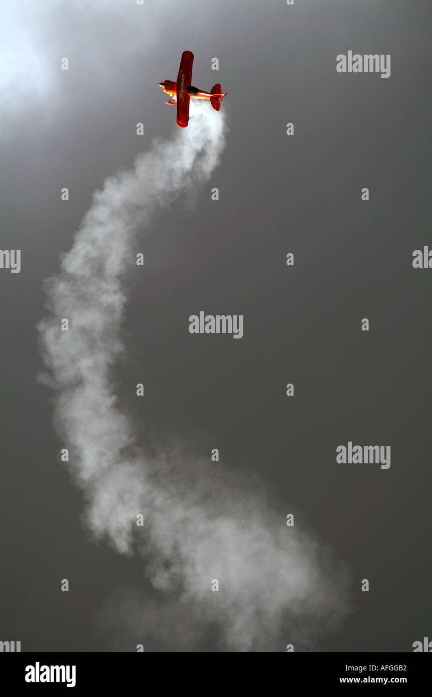 Radio controlled stunt plane performing an aerobatic display loop the ...