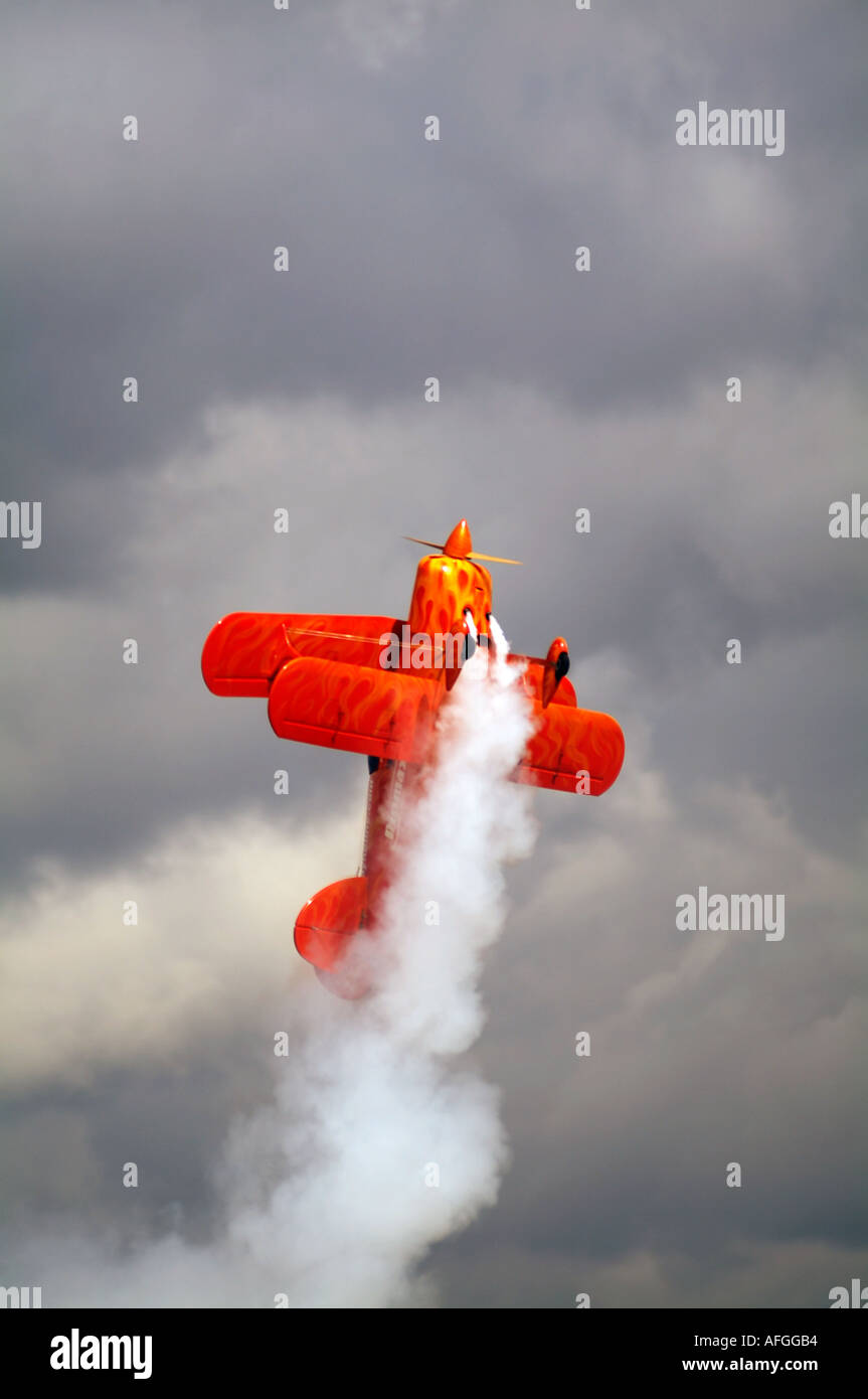 Radio controlled stunt plane performing an aerobatic display loop the ...