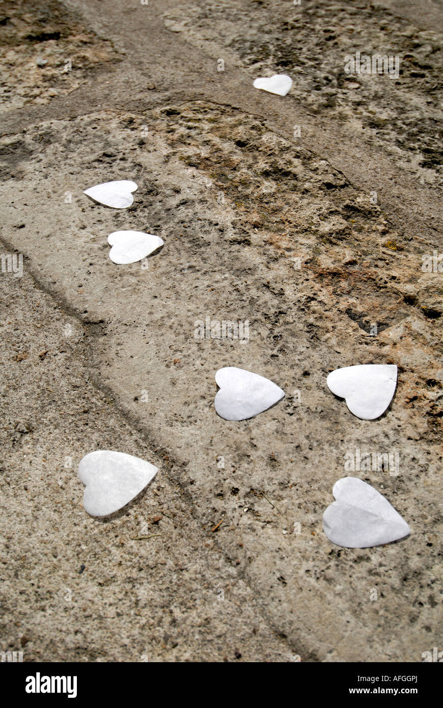 Confetti hearts in gutter, France Stock Photo - Alamy