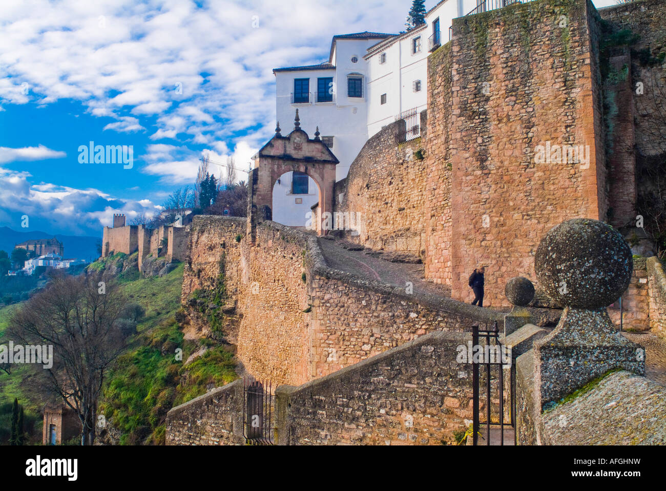 Arch of Philip V Roman bridge and walkway in Ronda Spain Stock Photo ...