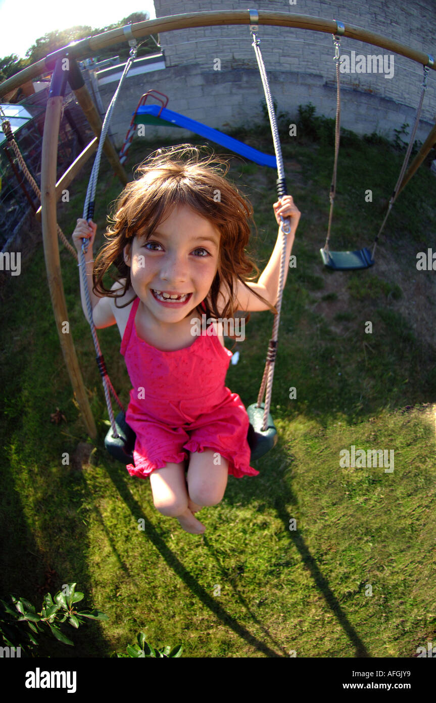 Swing, Girl on a swing Stock Photo - Alamy