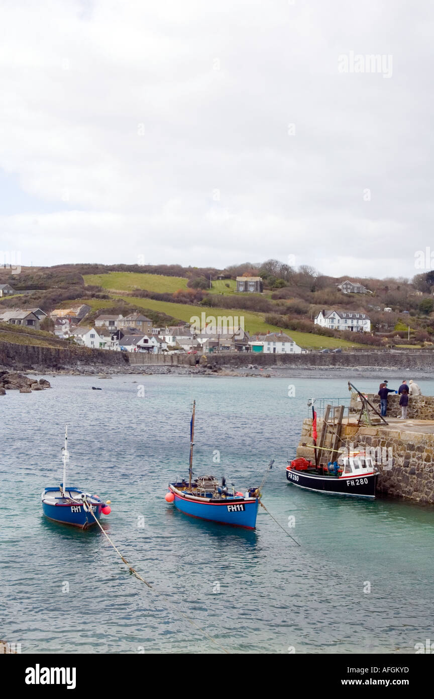 Coverack Harbour in Cornwall showing fishing boats and the beach in the ...