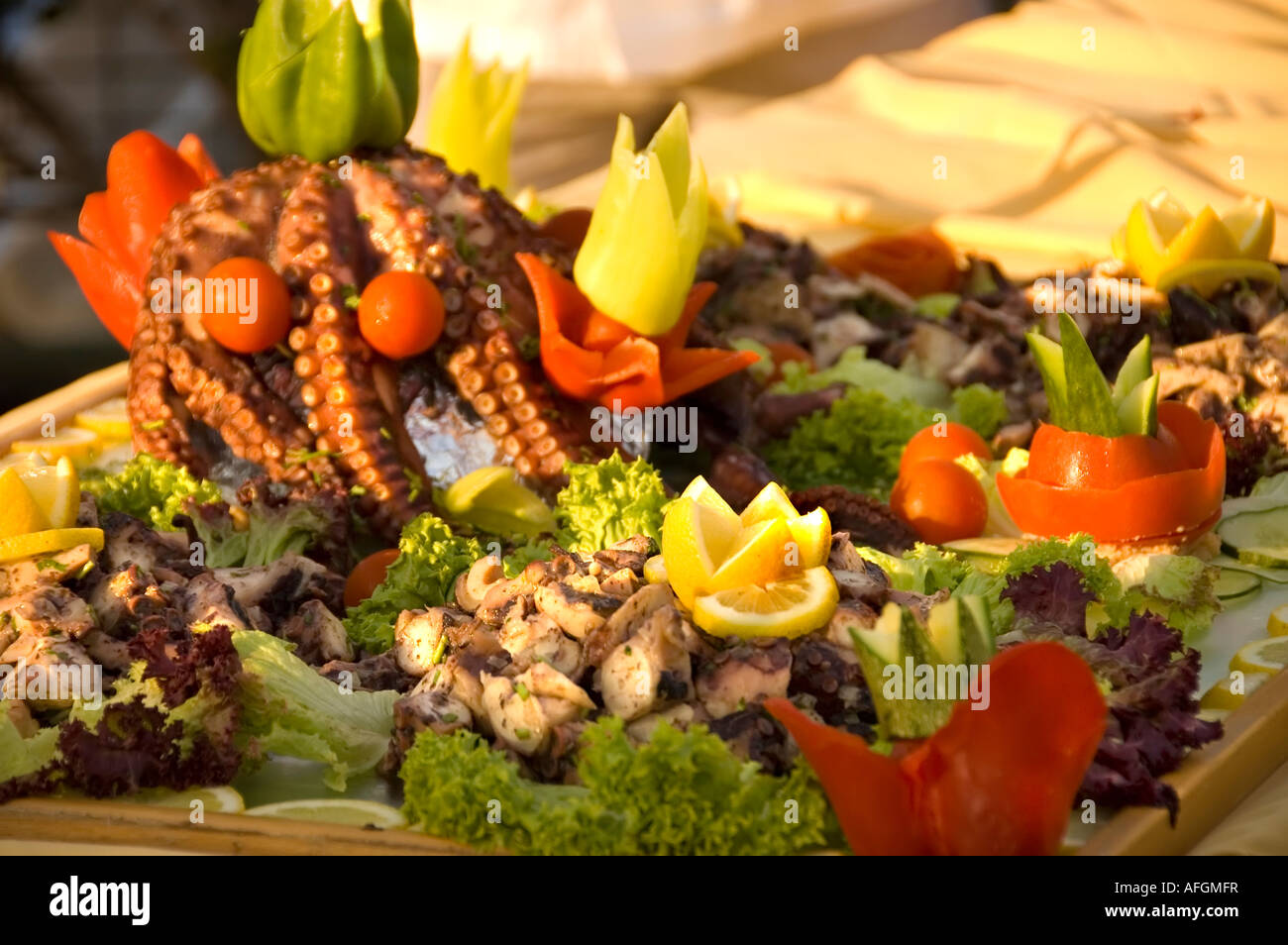 seafood octopus calamari and vegetable dish Stock Photo - Alamy